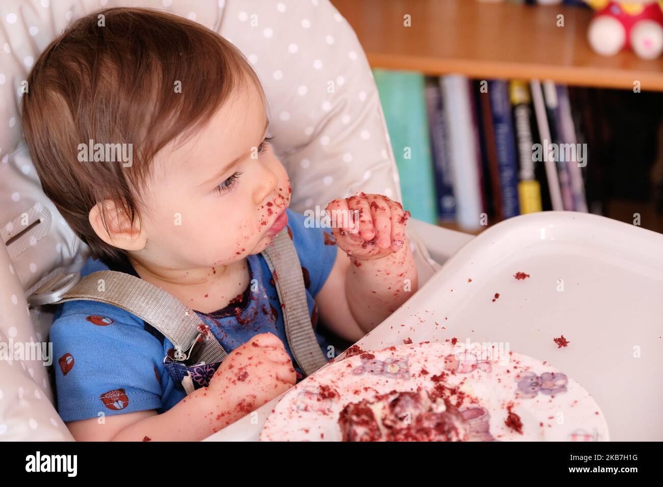 first birthday celebration and fist time eating cake for this little ...