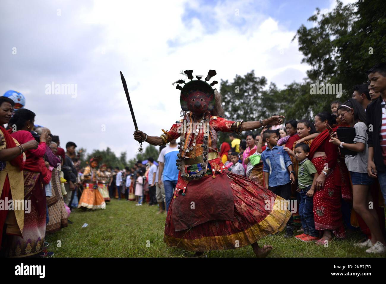 A Nepalese devotee impersonate as deity dance in a tunes of traditional ...
