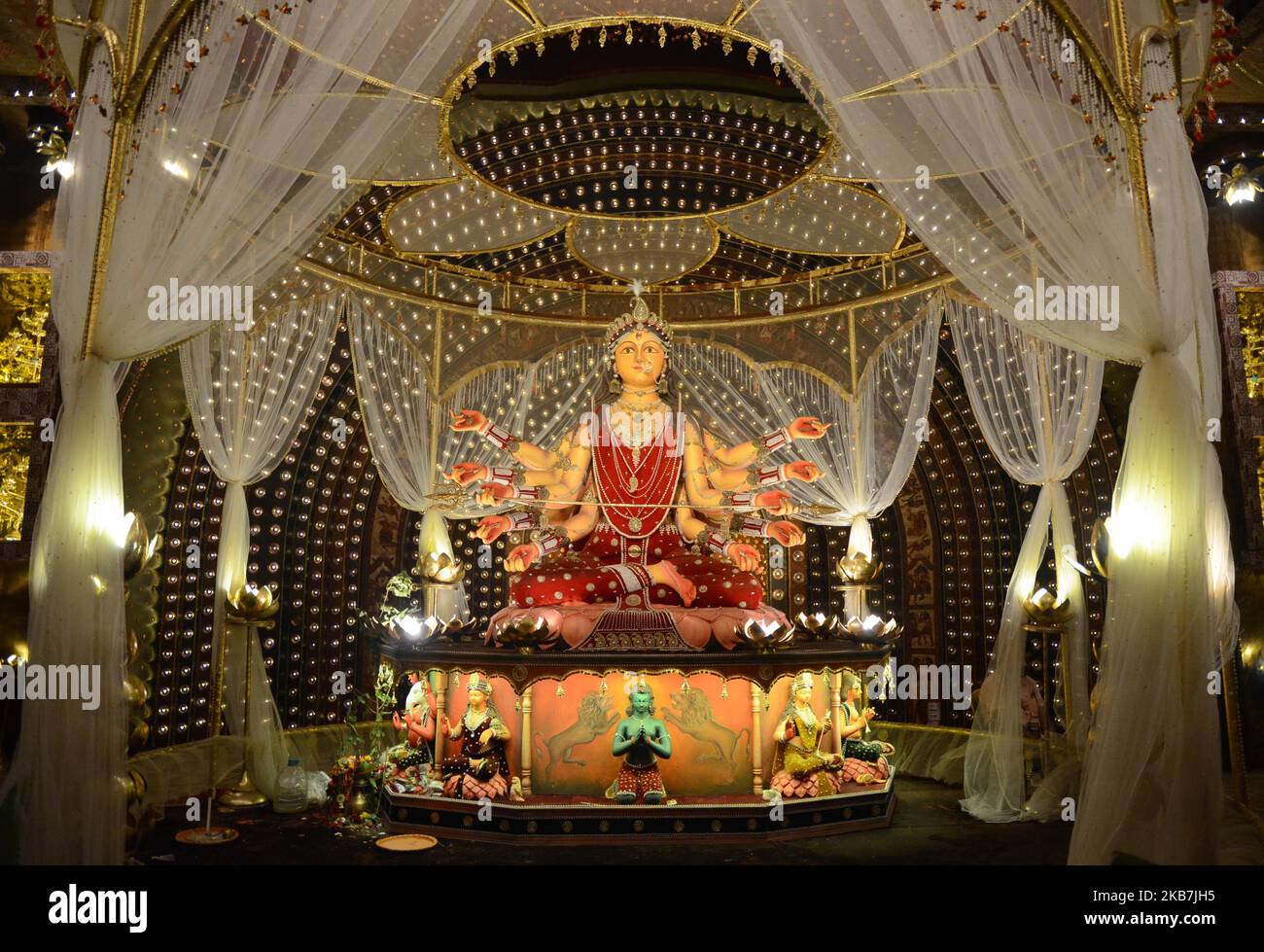 Durga idol and Puja pandal or temporary platform of a community Durga ...