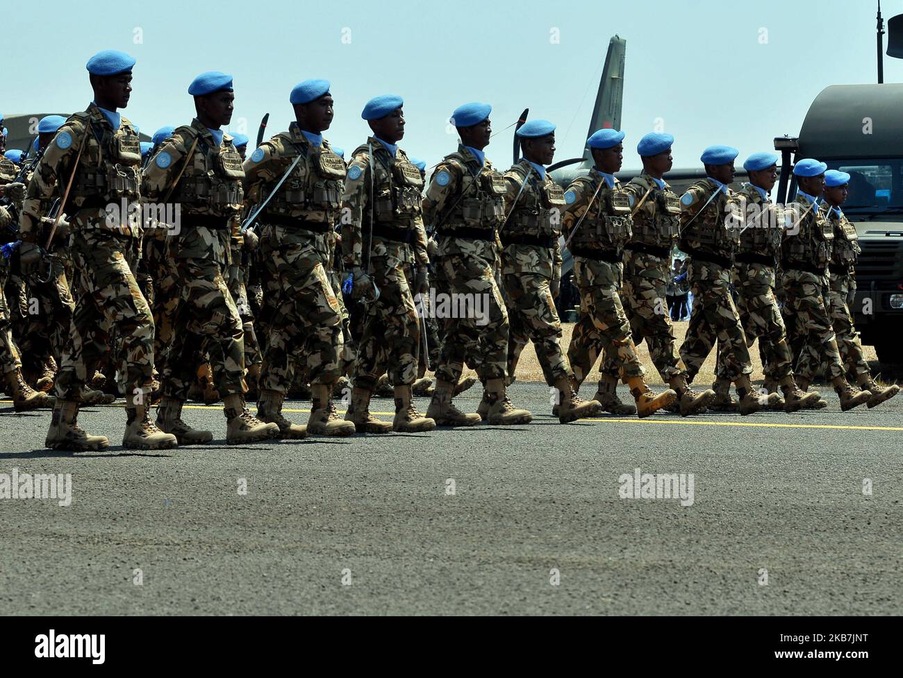 Indonesian National Armed Forces (TNI) soldiers mounted combat vehicles ...