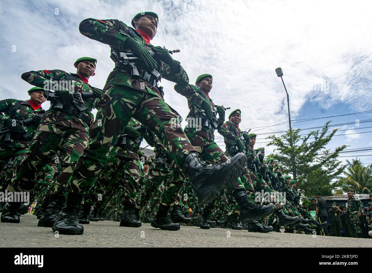 Troops marched during the devil at the 74th anniversary celebration of ...