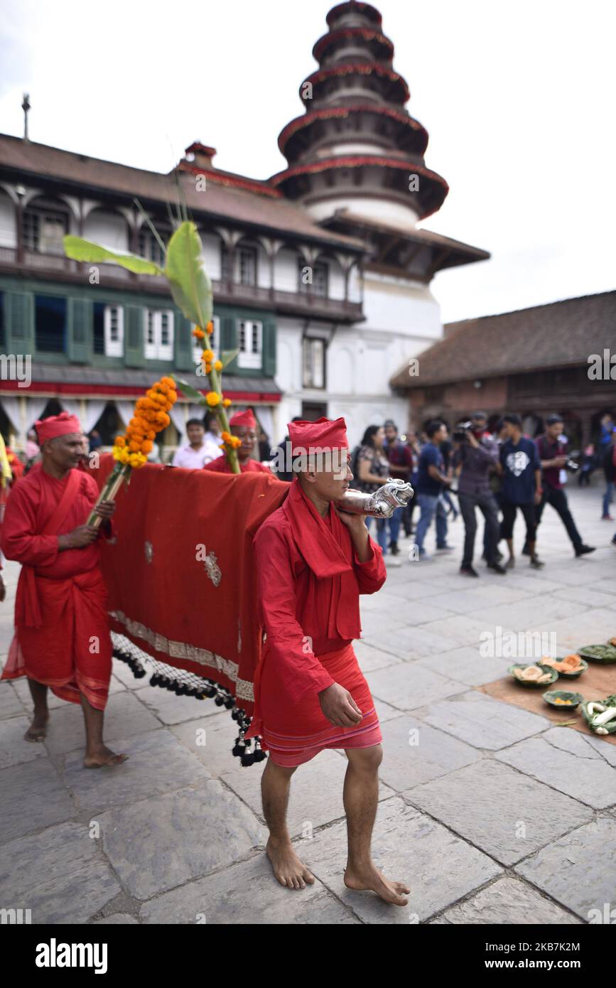 Nepalese priests along with devotees brought Fulpati festival during ...
