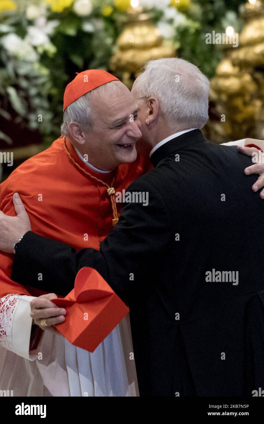 New cardinal Matteo Maria Zuppi (L) attends Pope Francis' opening Mass ...
