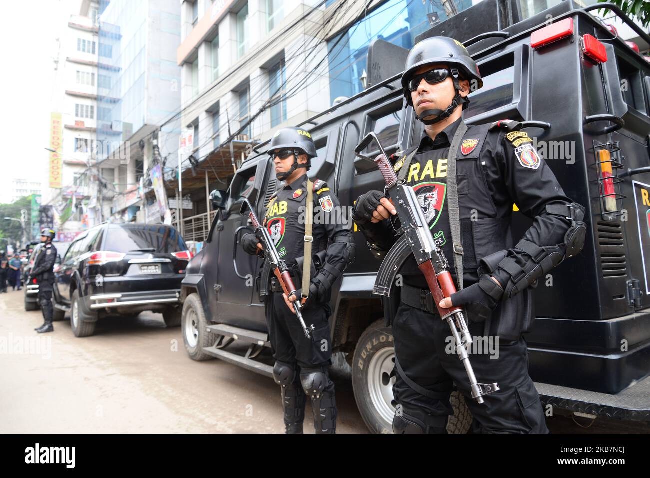 Rapid Action Battalion (Rab) members confine the office of Jubo League ...