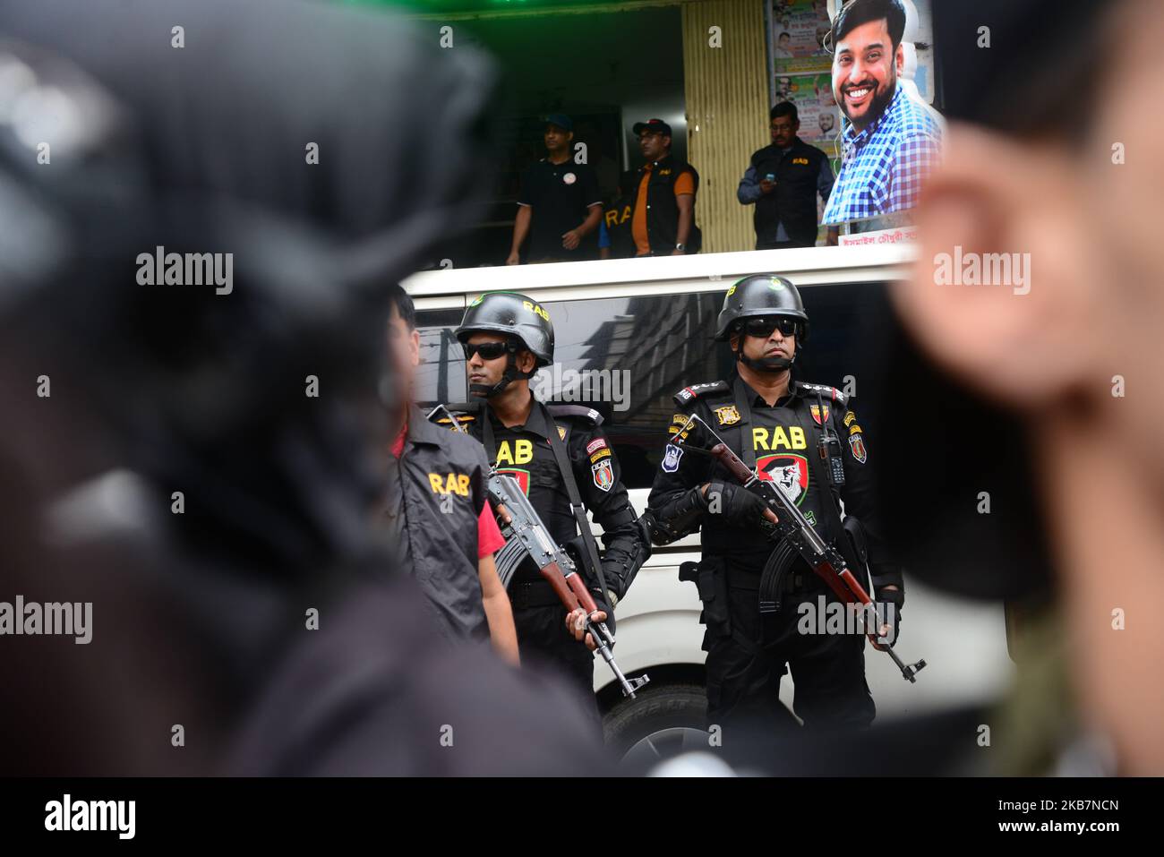 Rapid Action Battalion (Rab) members confine the office of Jubo League ...