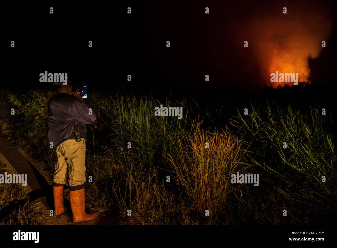 This picture taken on October 06, 2019 shows an Indonesian firefighter ...