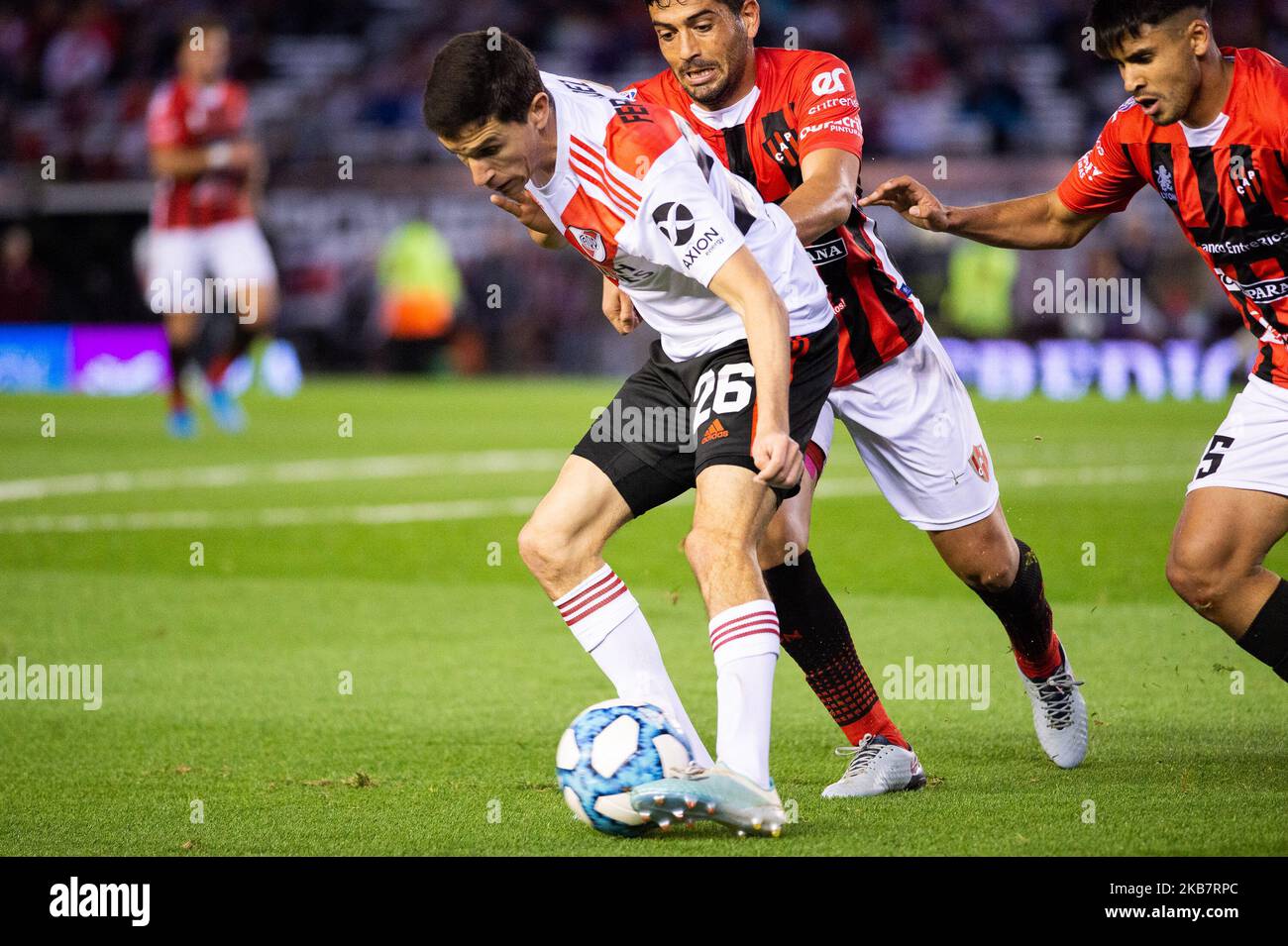 Ignacio Fernandez of River Plate drive the ball during a match between ...
