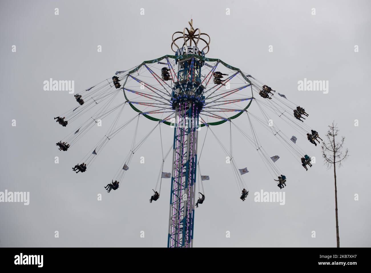 A carousel 80 meters high. The Wiesn - as it is called by locals - is ...