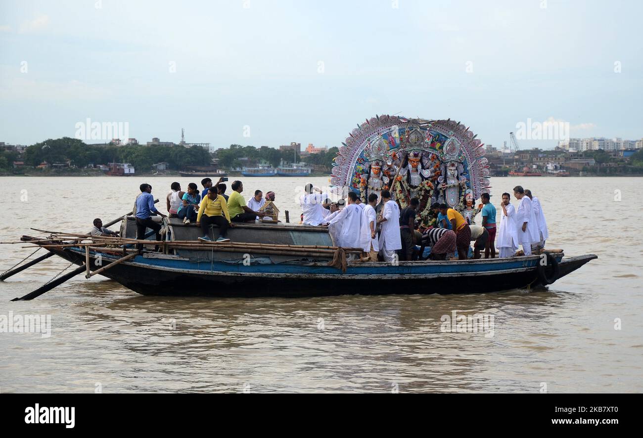 Immersion of Idol goddess Durga in the River Ganges on the last day of ...