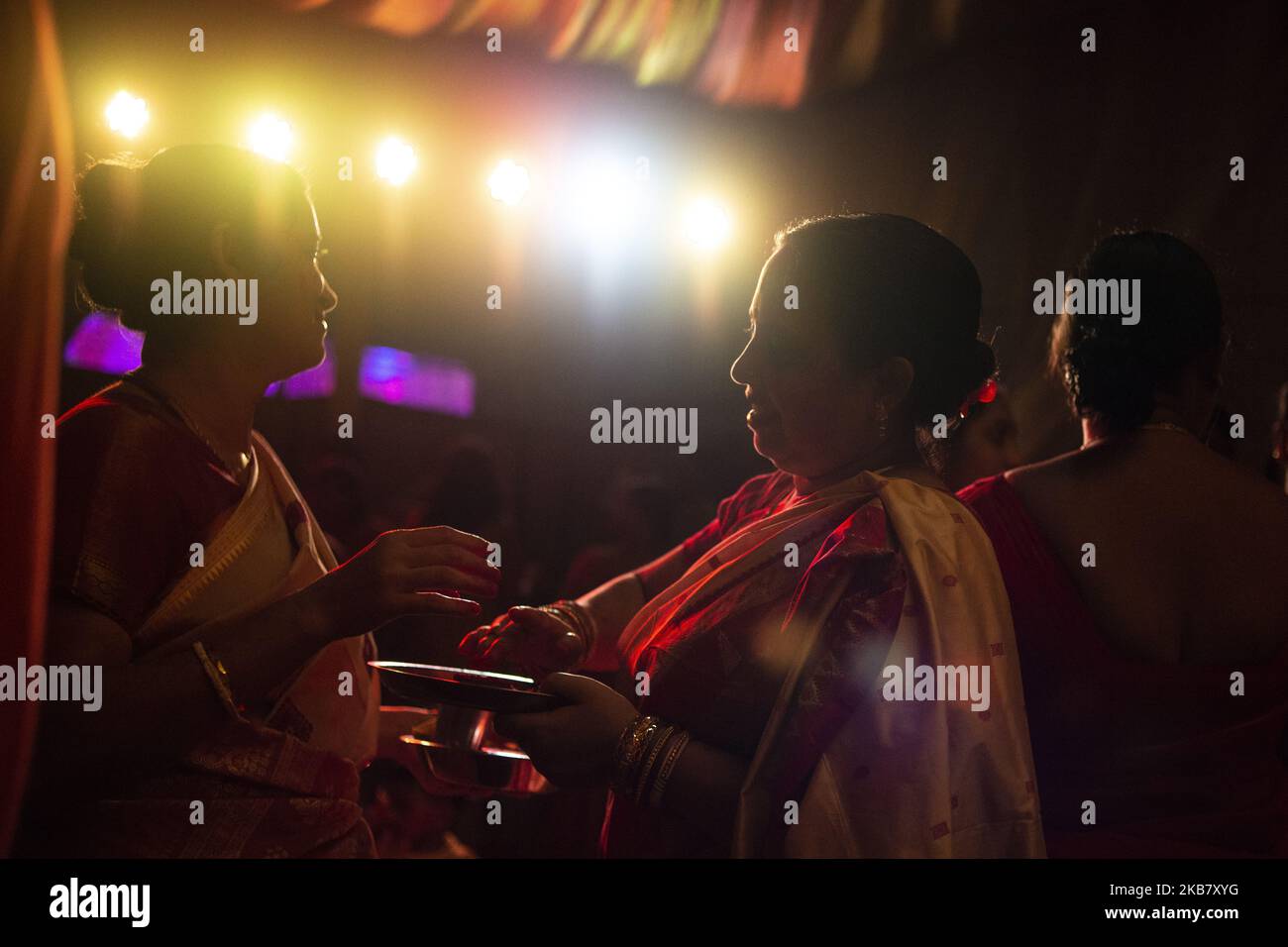 Hindu married women playing with vermilion powder as a part of their ...