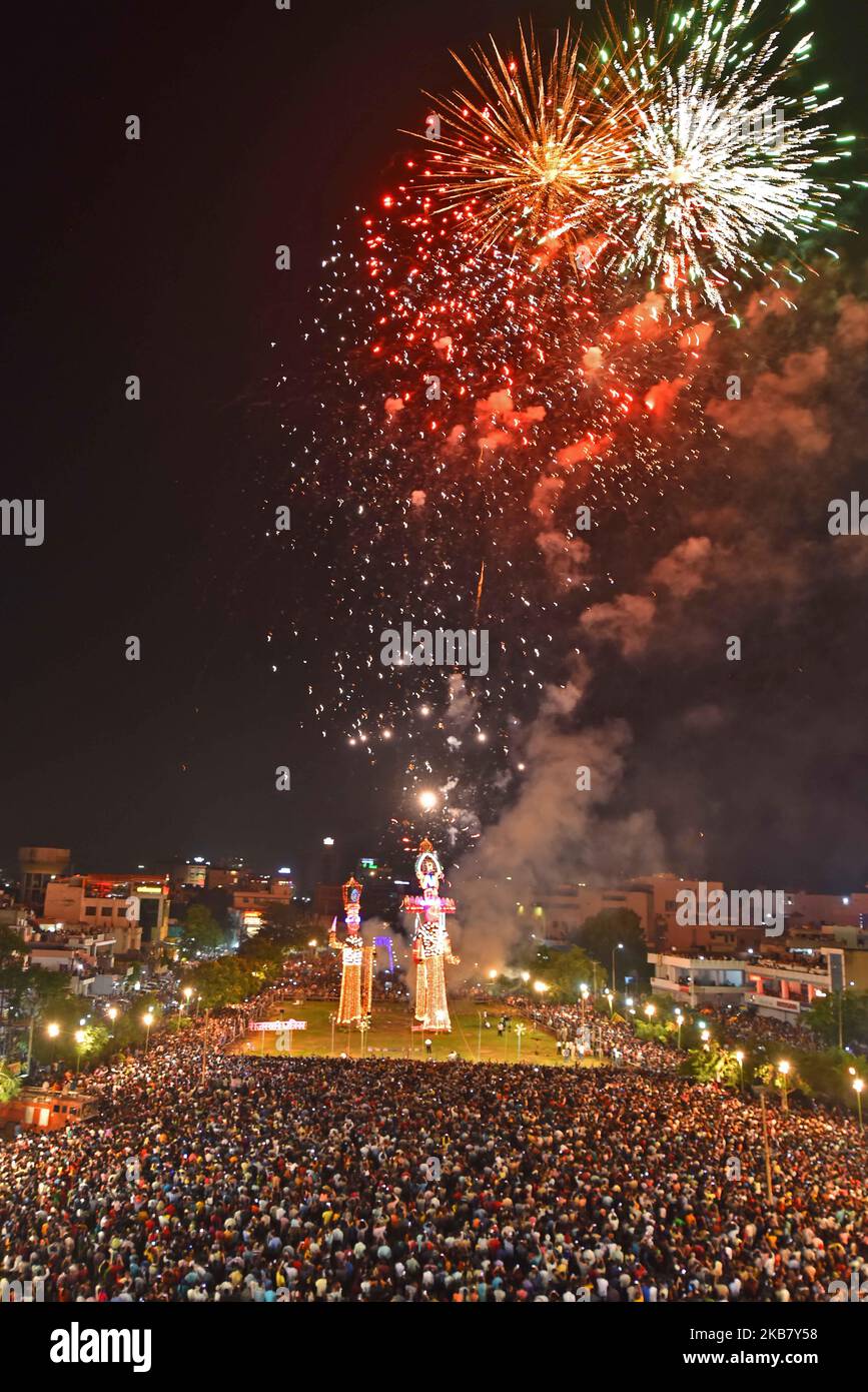 An effigy of demon king Ravana is set on fire during the Dusshera ...