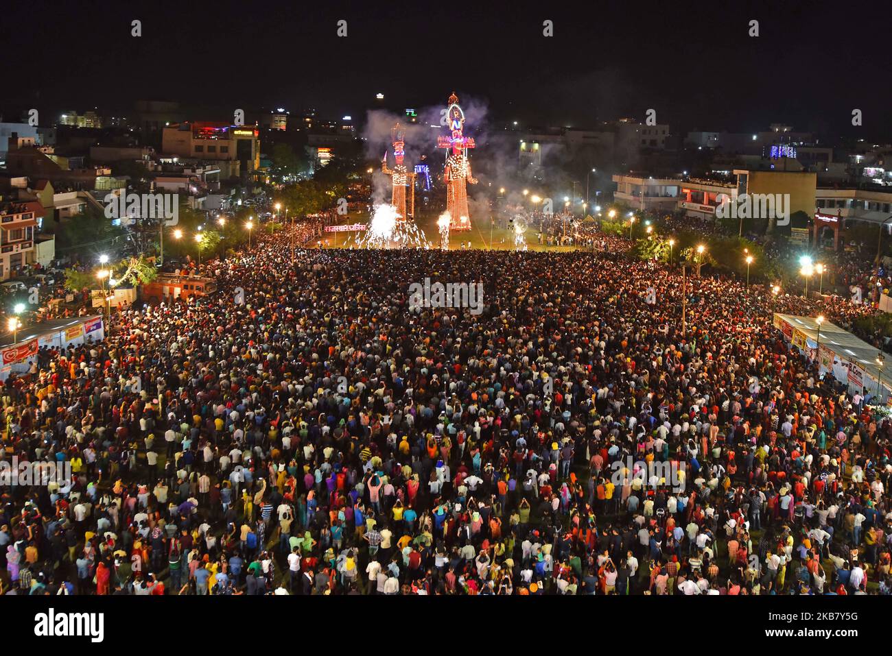 An effigy of demon king Ravana is set on fire during the Dusshera ...