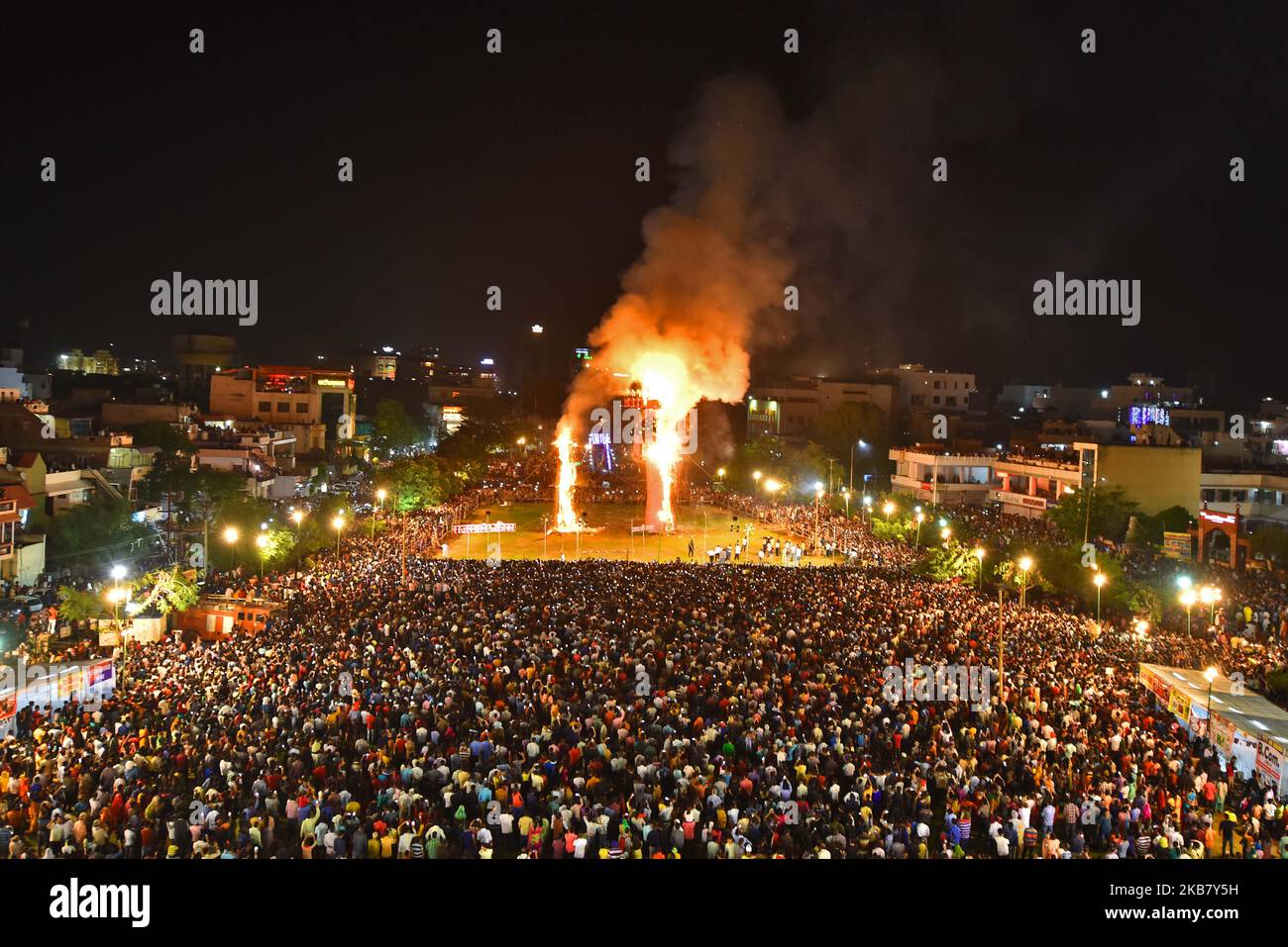An effigy of demon king Ravana is set on fire during the Dusshera ...