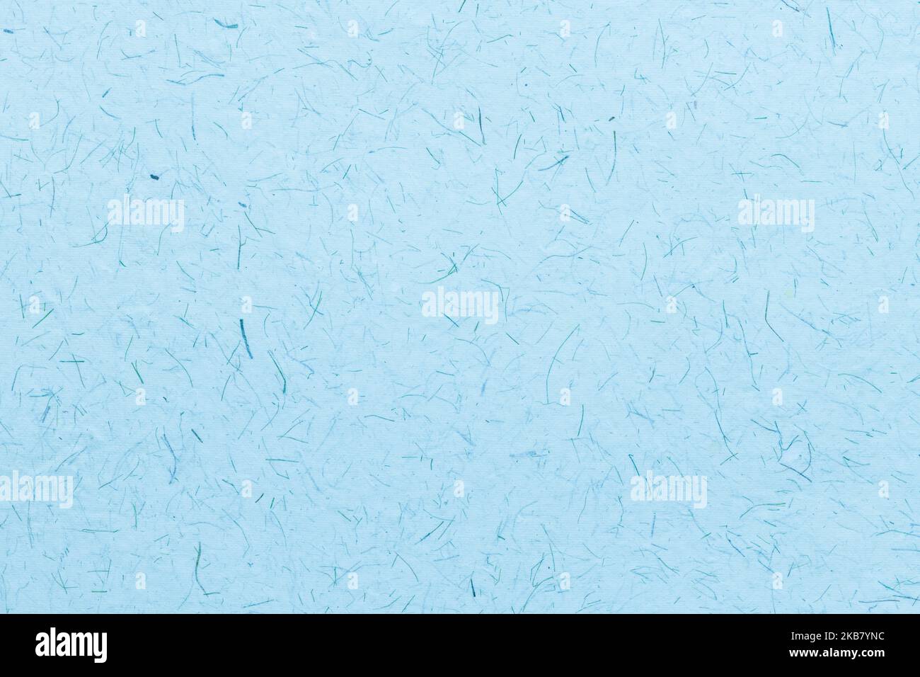 Closeup of blue tinted recycled paper with visible fibers Stock Photo ...