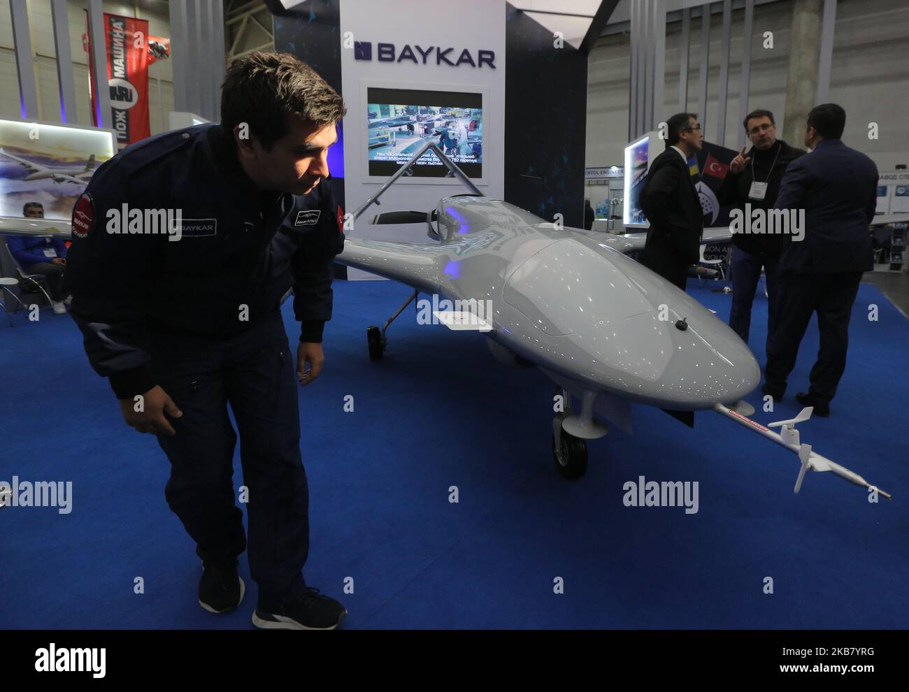 Baykar serviceman inspects Bayraktar TB2 unmanned aerial vehicle at the ...