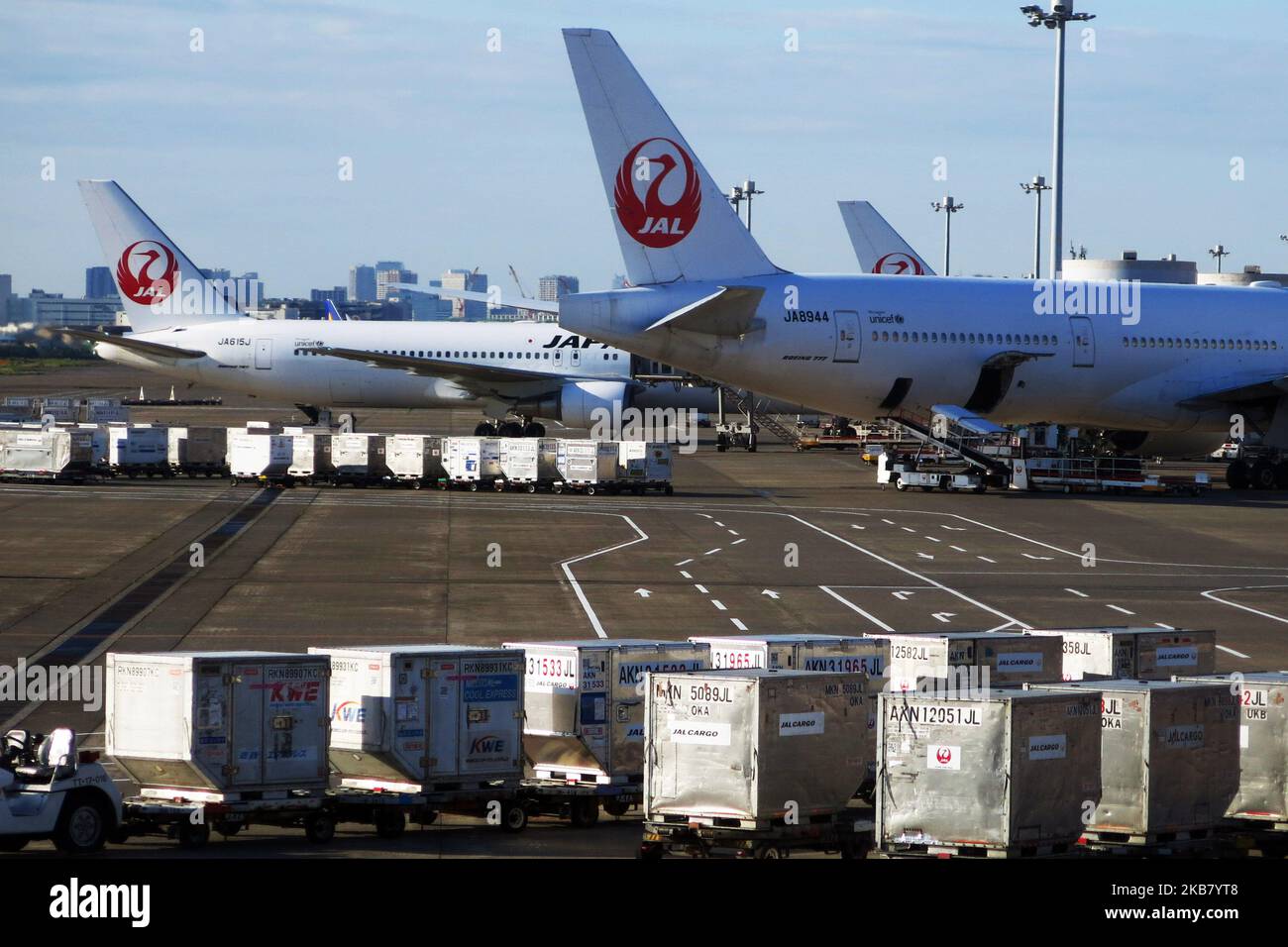 Japan Airlines Co. (JAL) aircraft stand at Haneda Airport in Tokyo ...