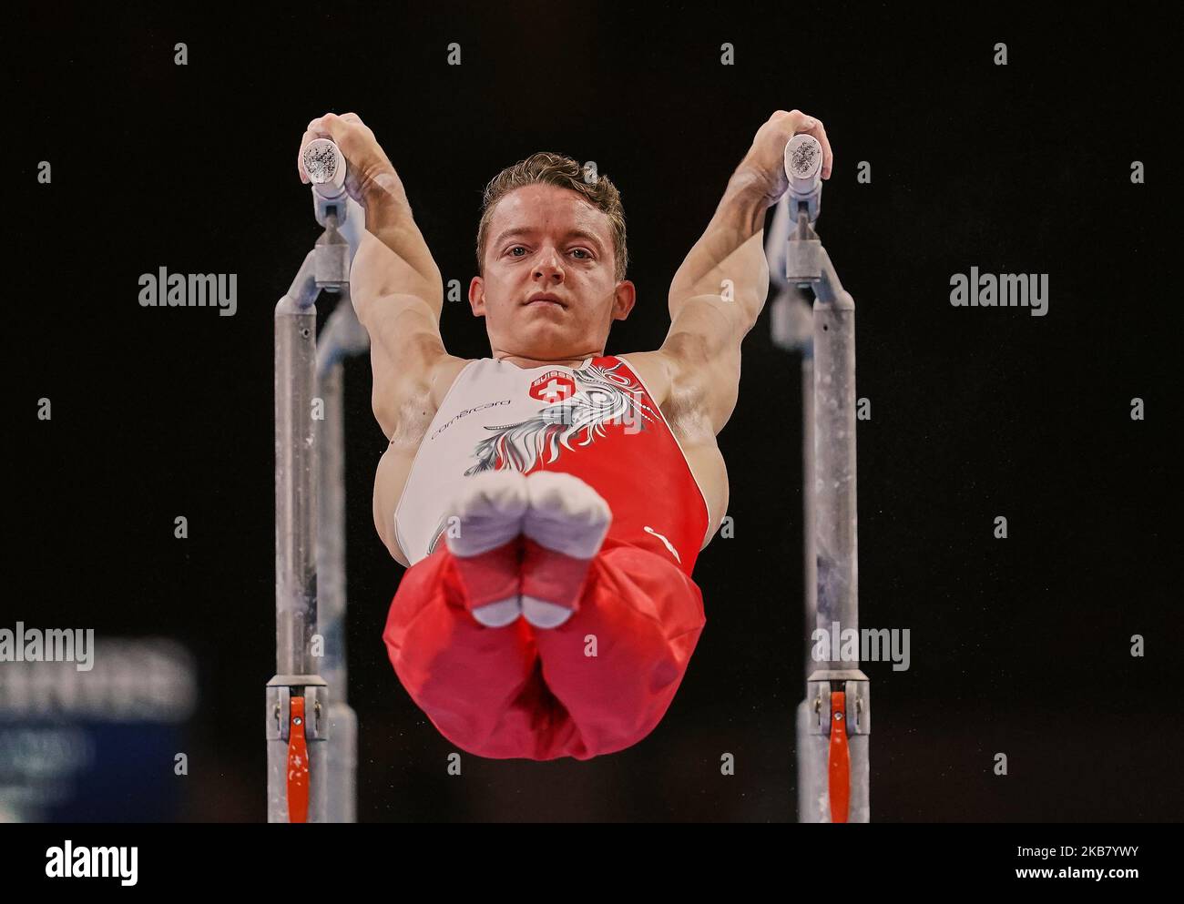 Christian Baumann of Switzerland during parallel bars for men at the ...