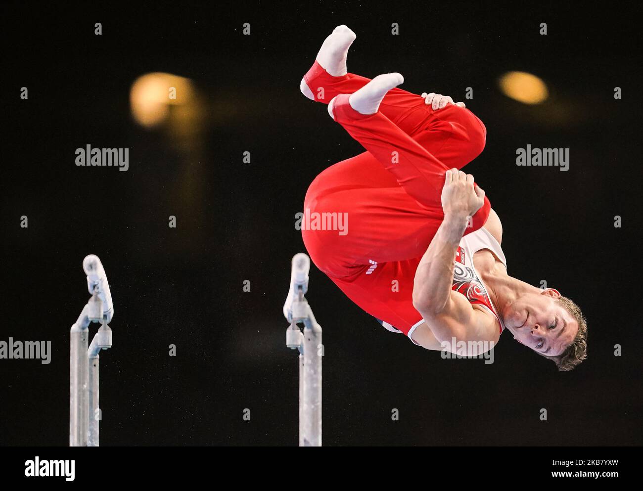 Christian Baumann of Switzerland during parallel bars for men at the ...