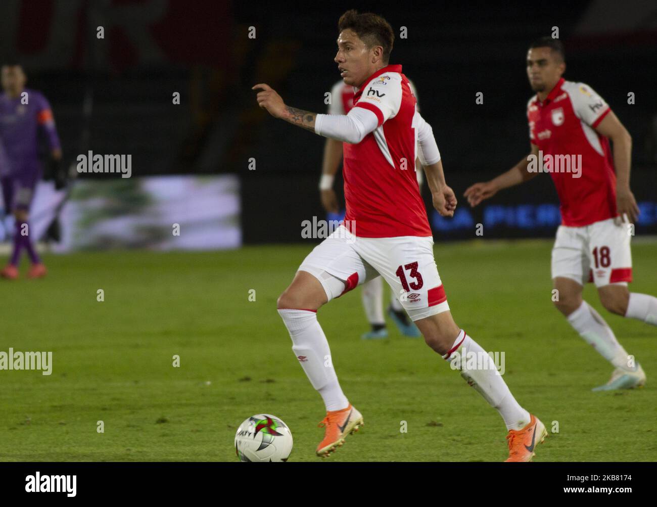 Sebastian Salazar of Independiente Santa Fe controls the ball during a ...
