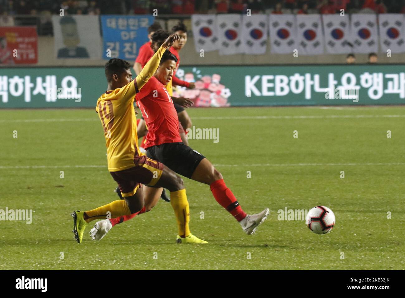 Hwang Hee Chan of South Korea and FKN Harsha of Sri Lanka action during ...