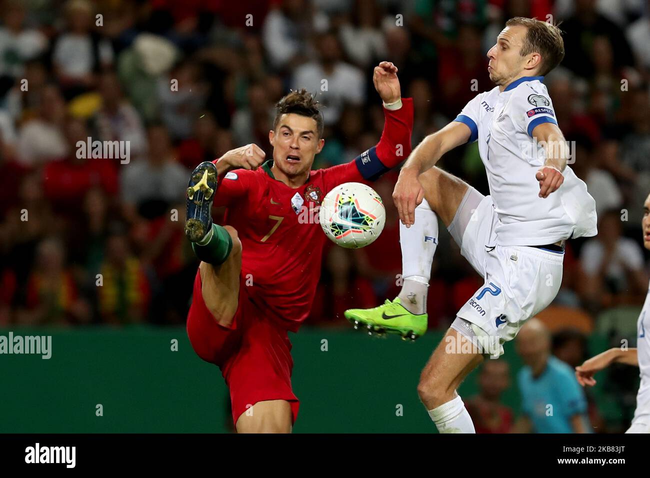 Portugal's forward Cristiano Ronaldo (L) vies with Luxembourg's ...