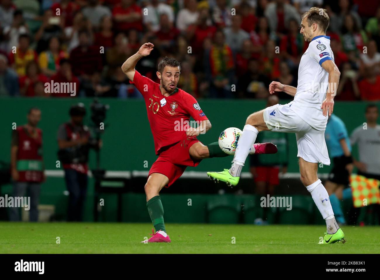 Portugal's forward Bernardo Silva (L) vies with Luxembourg's midfielder ...