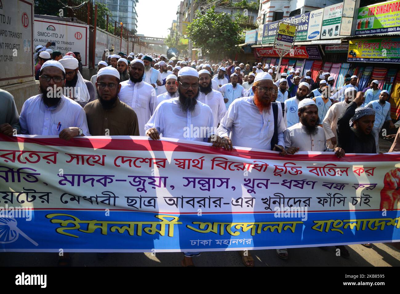 Supporters of Islami Andolon Bangladesh shout slogan as they take part ...