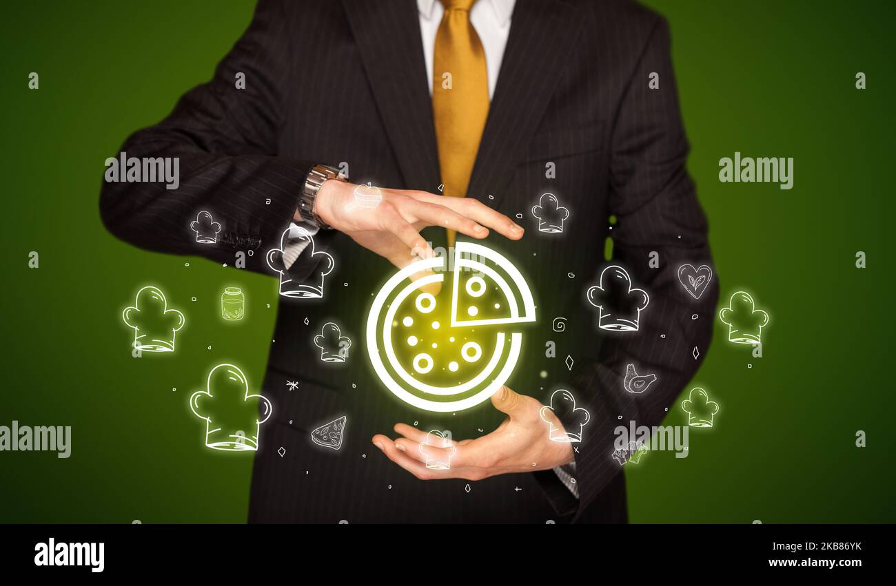 Hand holding food related icons Stock Photo - Alamy