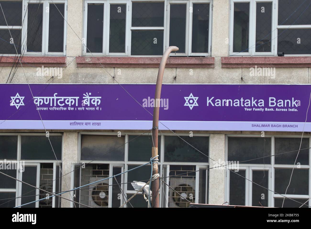 Karnataka Bank hoarding is installed outside their branch in New Delhi ...