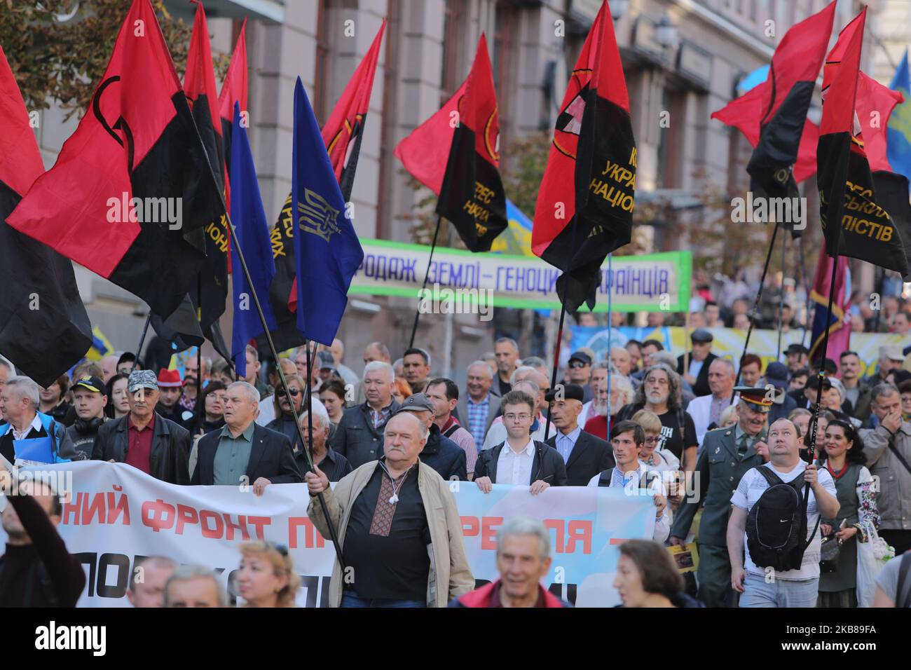Ukrainians participate a march under the flags of far-right Svoboda ...