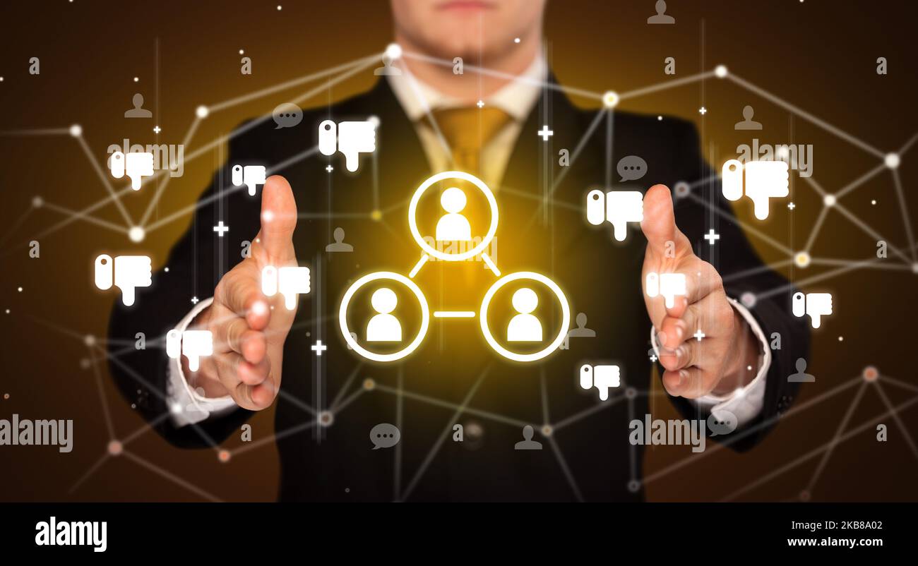 Hand holding social media icons Stock Photo - Alamy