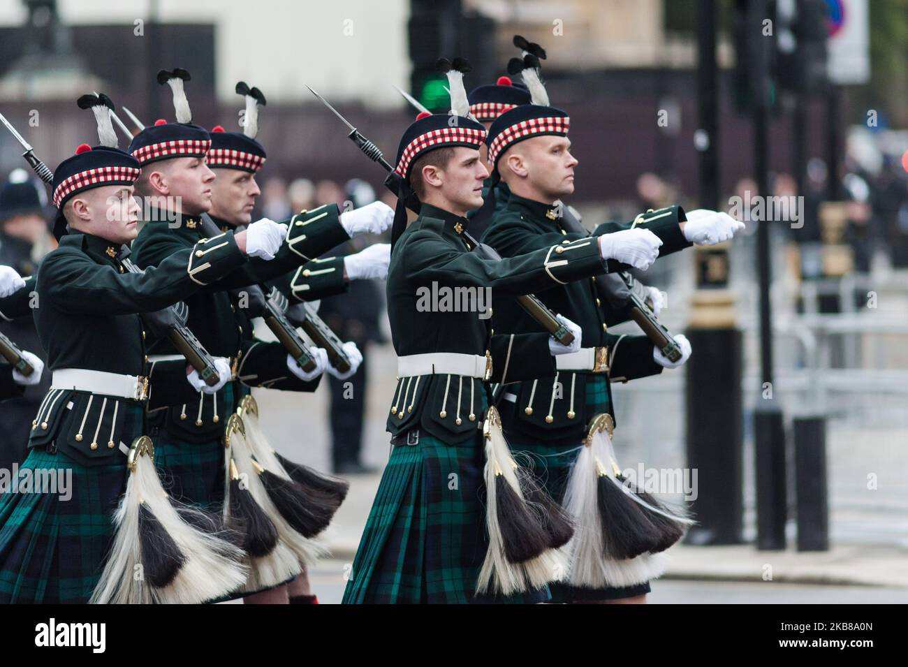 Members of 2nd Battalion The Royal Regiment of Scotland march outside ...