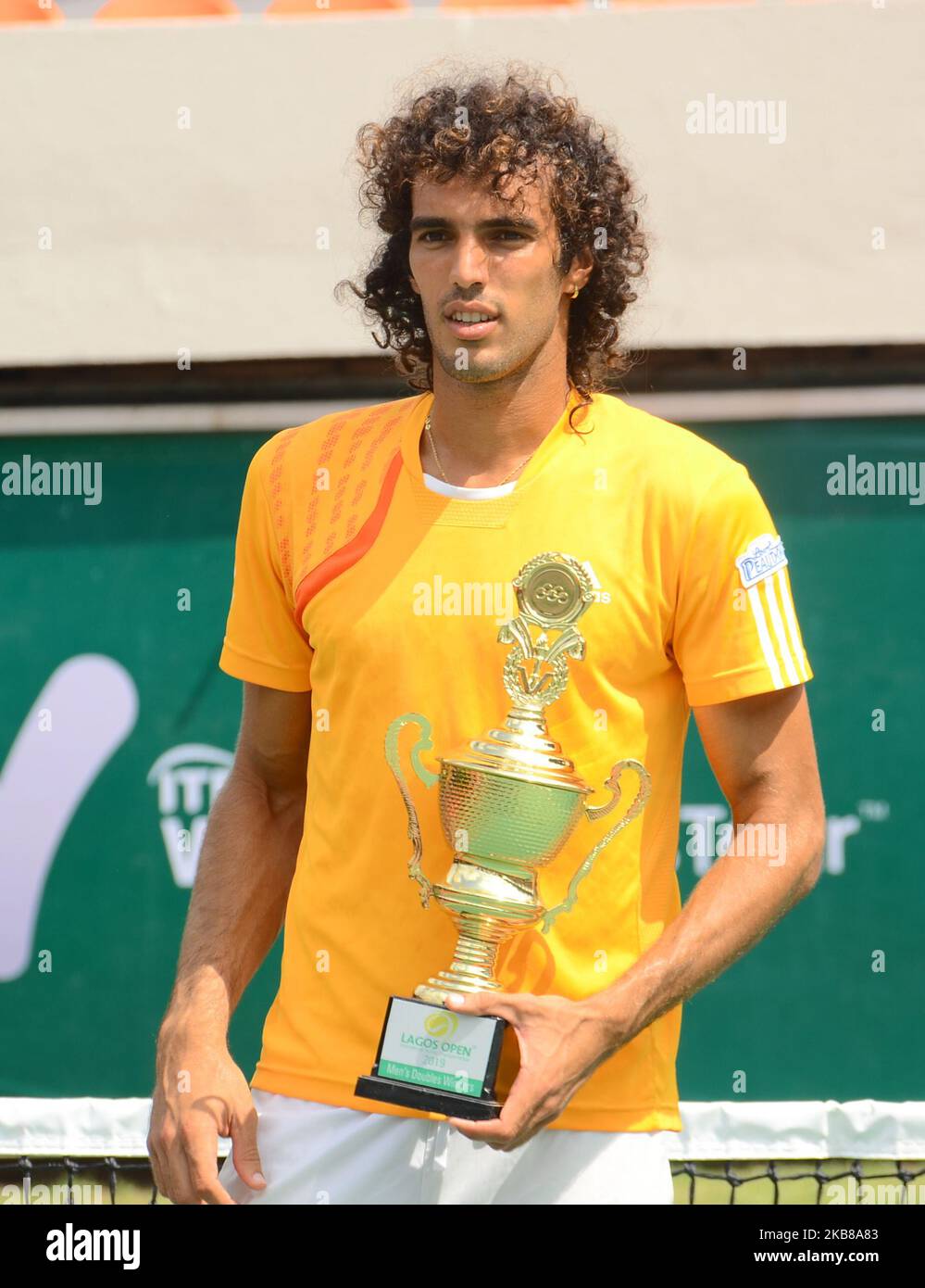 Tunisian Skander Monsouri poses with trophy after winners of the Men's ...