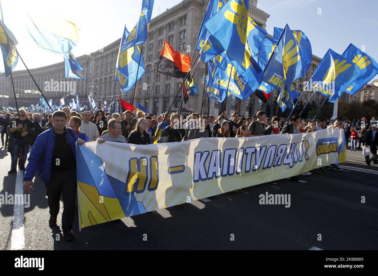Ukrainians carries a banner reading 'No to capitulation!' during a ...