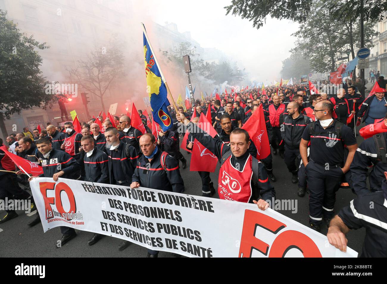 Firefighters protest as they march during the day of mobilization and ...