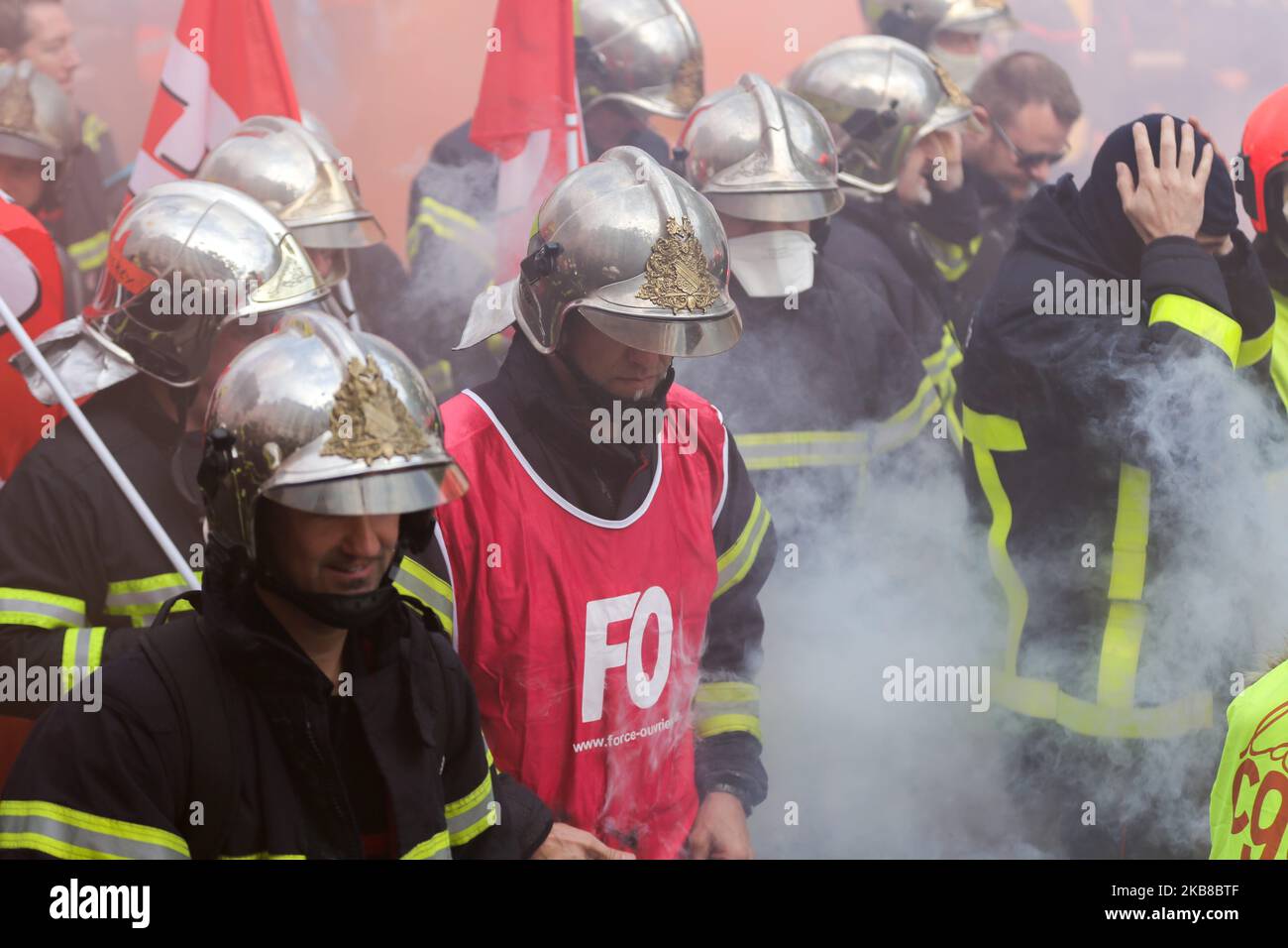 Firefighters protest as they march during the day of mobilization and ...