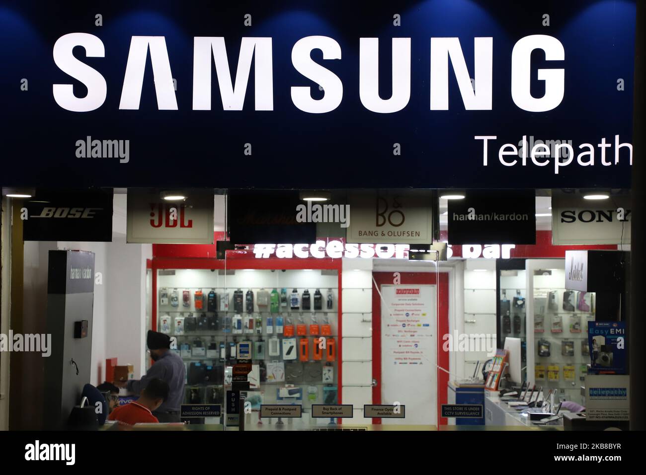 Employees are seen inside a Samsung Showroom in New Delhi India on 15 ...