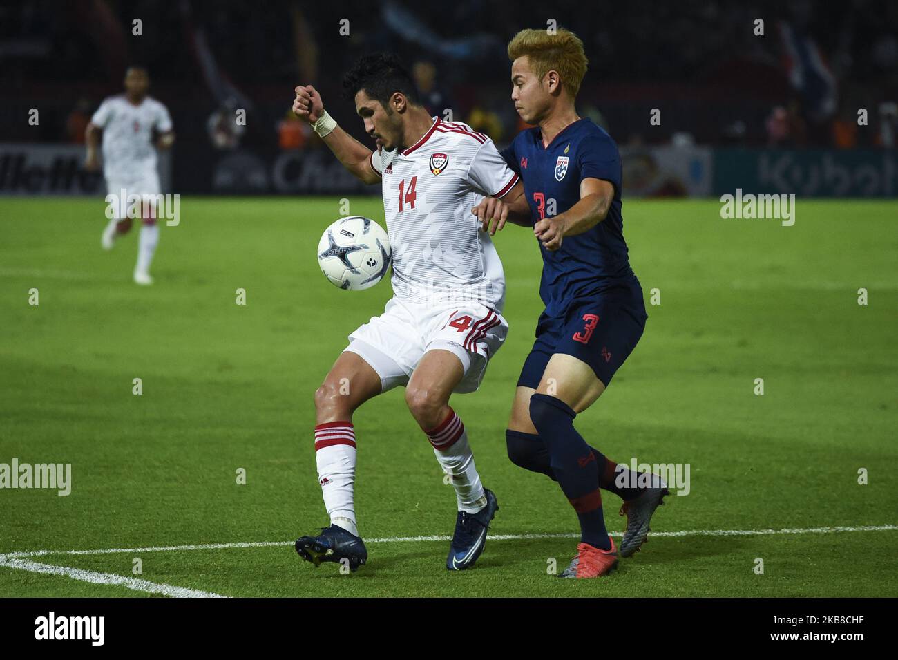 Tareq Ahmed (L) of the UAE in action against Thailand's Theerathon ...