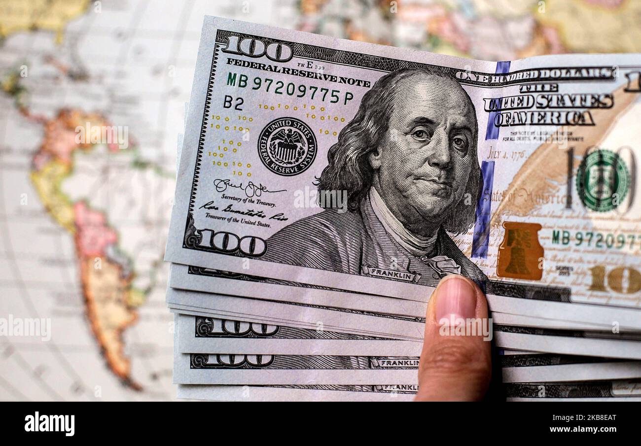 A photo illustration show the US Dollars in Buenos Aires, Argentina, on ...