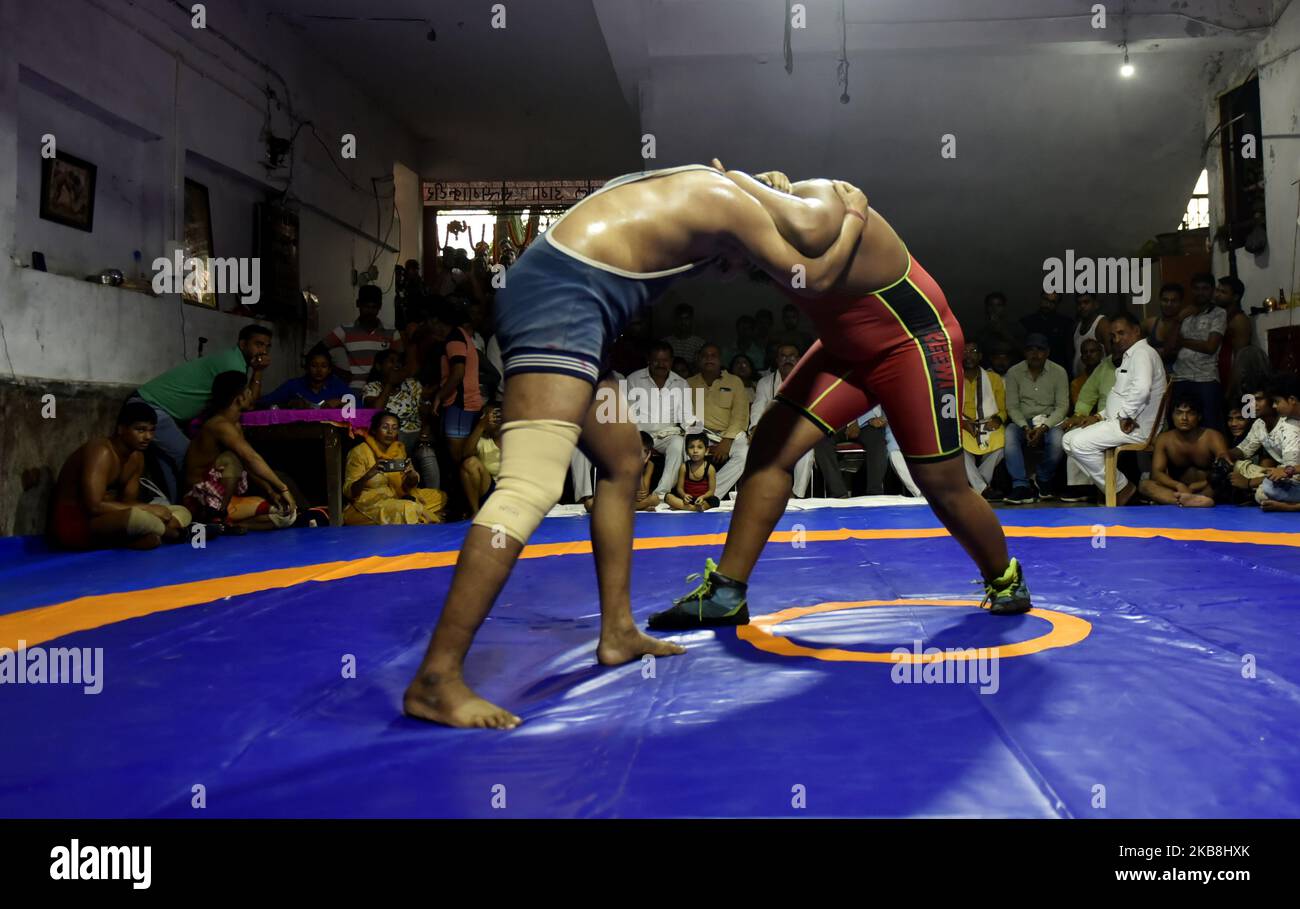 Wrestlers compete for a local Kushti competition in Kolkata, India, 18 ...