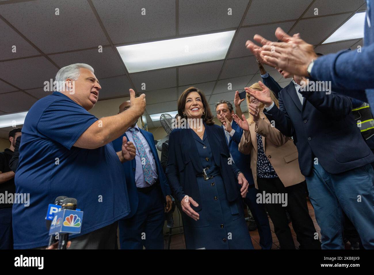 NY Governor Kathy Hochul with transport workers at the Quill bus depot ...