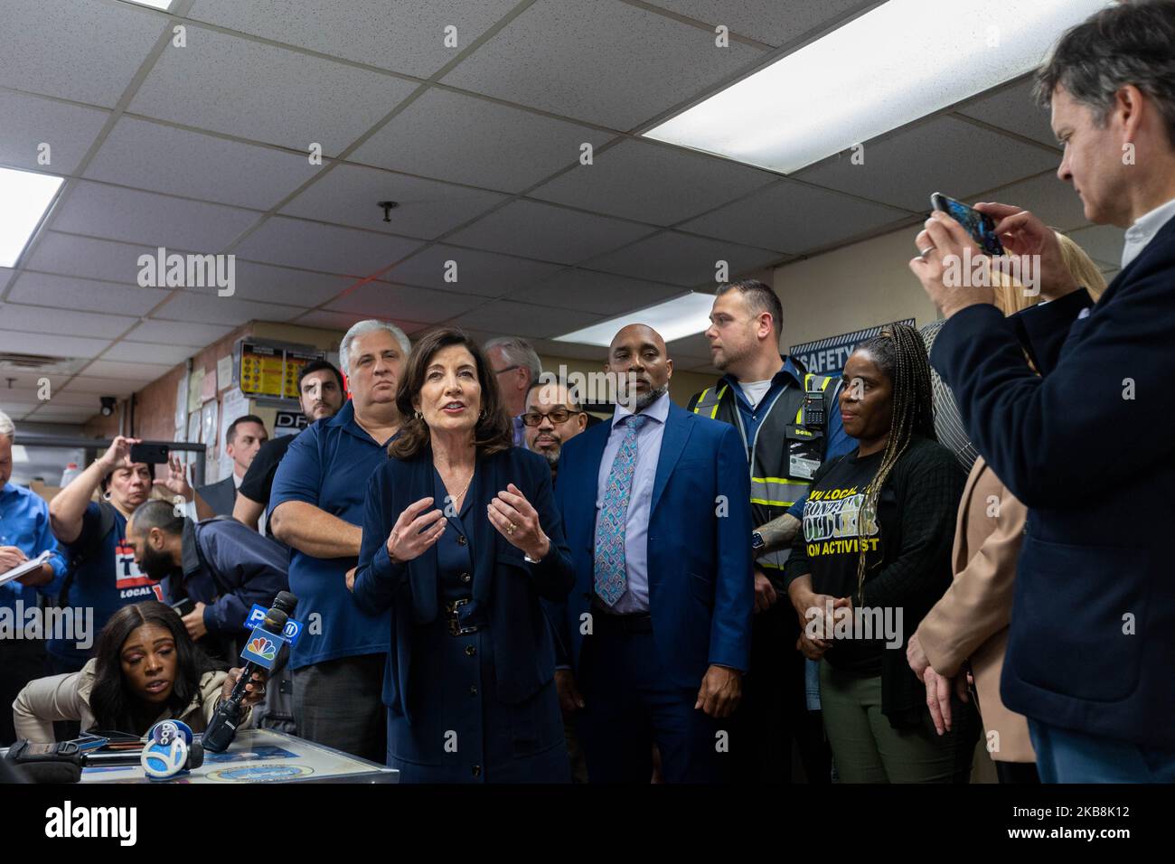 NY Governor Kathy Hochul with transport workers at the Quill bus depot ...
