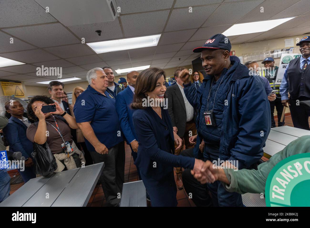 NY Governor Kathy Hochul with transport workers at the Quill bus depot ...