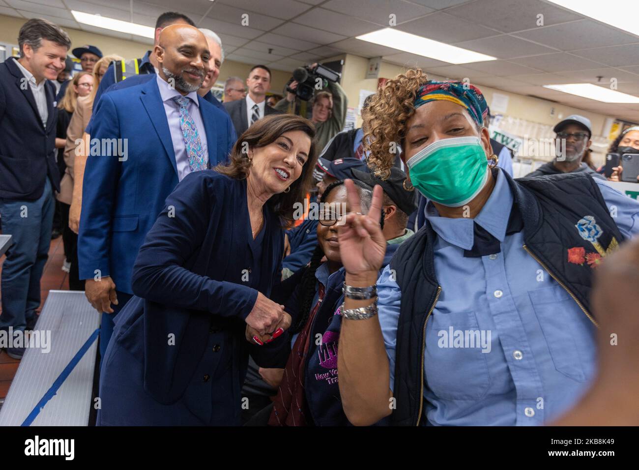 NY Governor Kathy Hochul with transport workers at the Quill bus depot ...