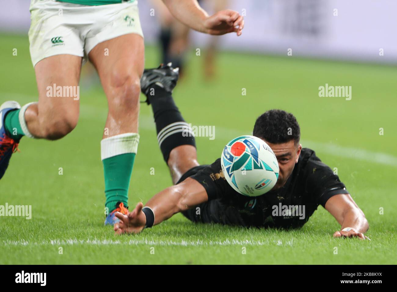 Aaron Smith of New Zealand is tackled during the 2019 Rugby World Cup ...