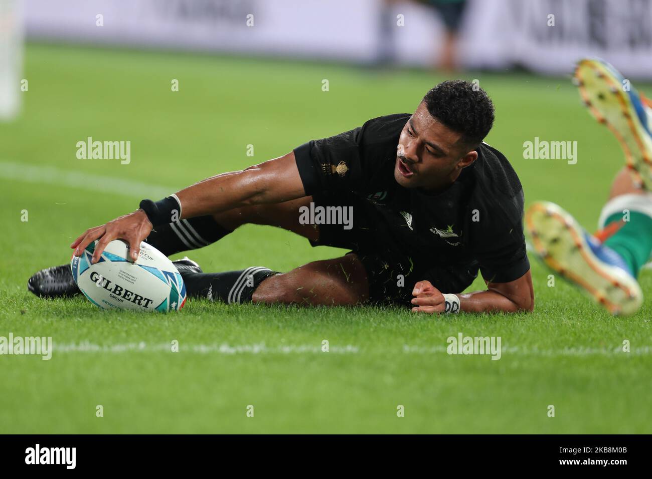 Aaron Smith of New Zealand is tackled during the 2019 Rugby World Cup ...