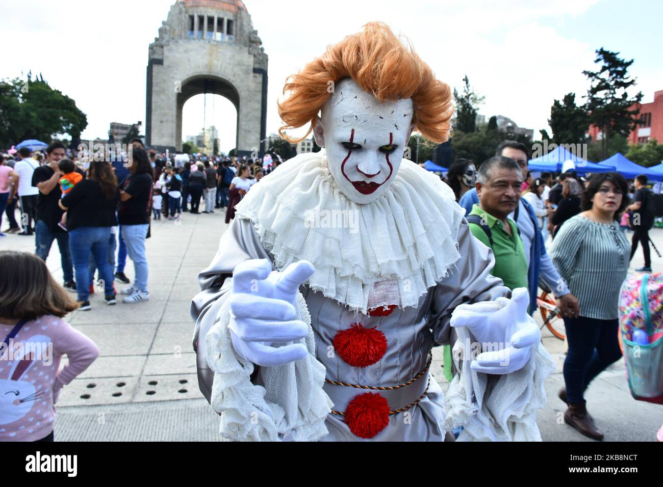 A man disguised as Pennywise (IT) is seen taking part during the march ...