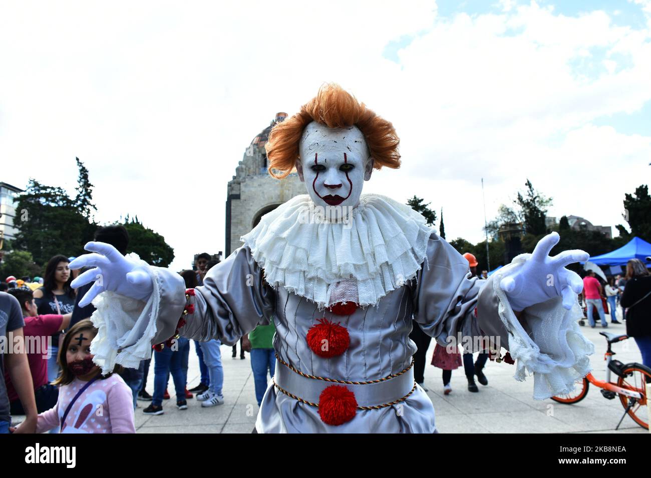 A man disguised as Pennywise (IT) is seen taking part during the march ...