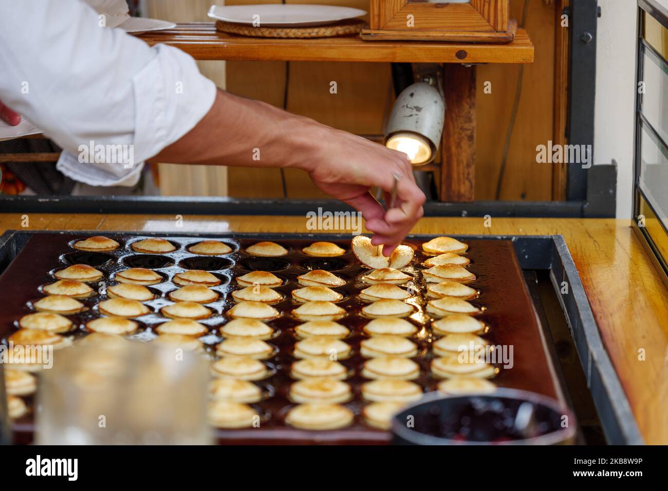 Selective focus view at Poffertjes, little Dutch Pancakes, on the ...