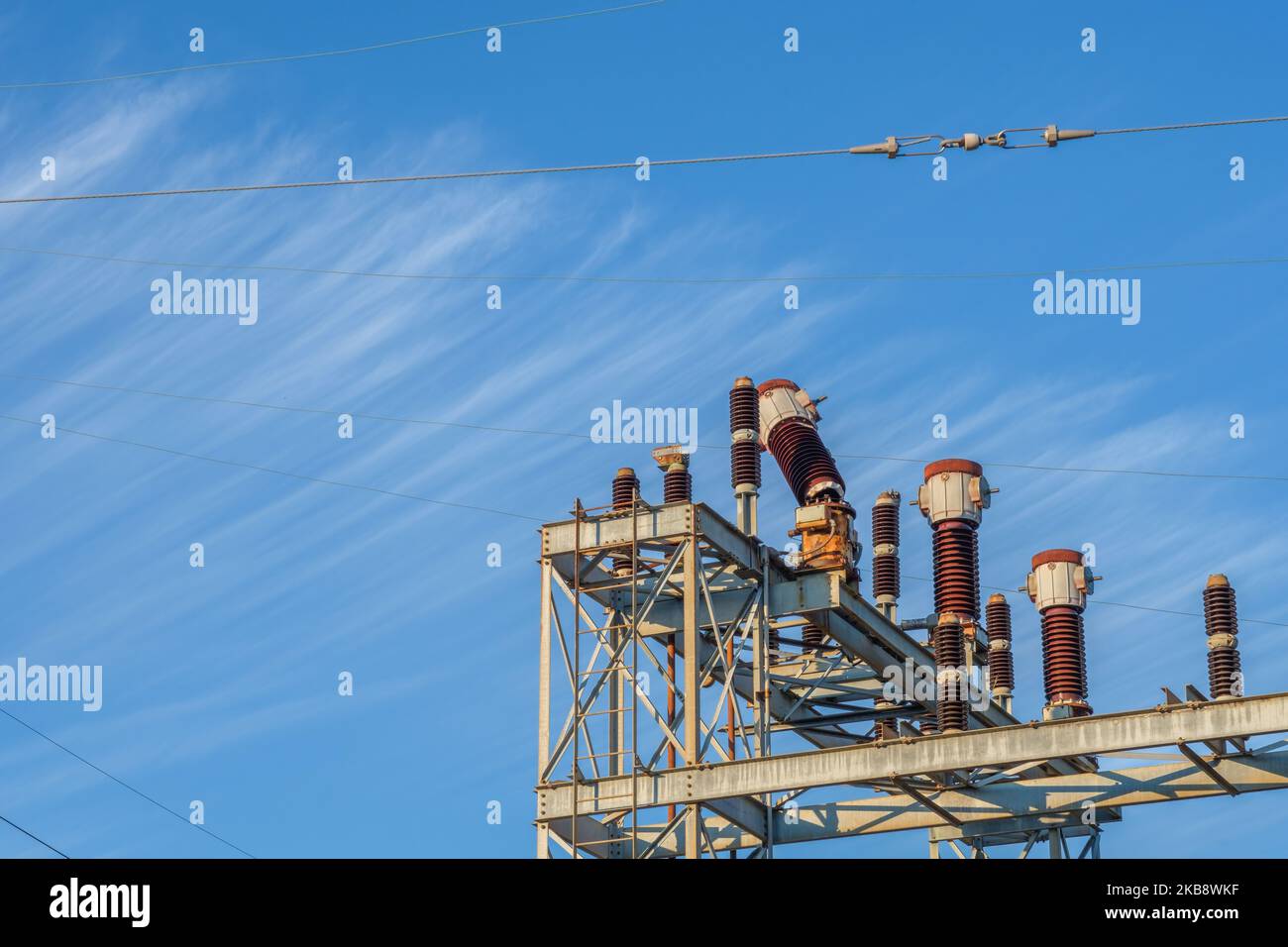 Section of a power station with a storm damaged component on a wispy ...